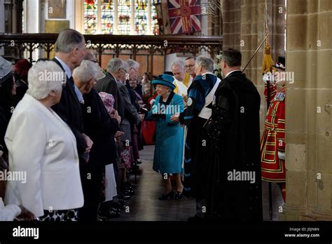 Queen Elizabeth Ii Distributes The Traditional Maundy Money To 91 Men