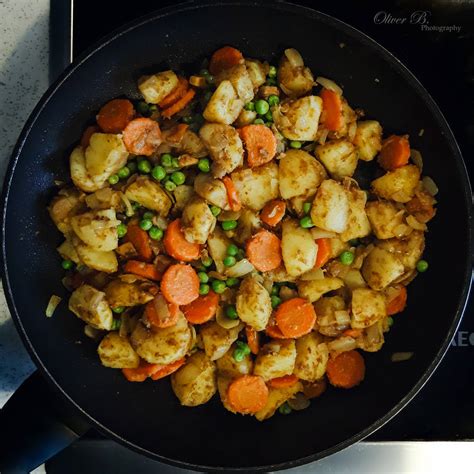 Aloo Gajar Matar Indian Potato Carrots And Peas By