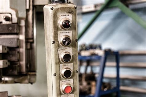 A Worker Is Operating Remote Swtich To Control Overhead Crane At The