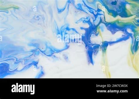 Blue And White Background Image Paint Drips Off The Canvas Liquid