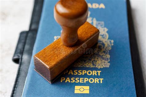 Canadian Passport And Stamp Holiday And Business Travel Concept Stock