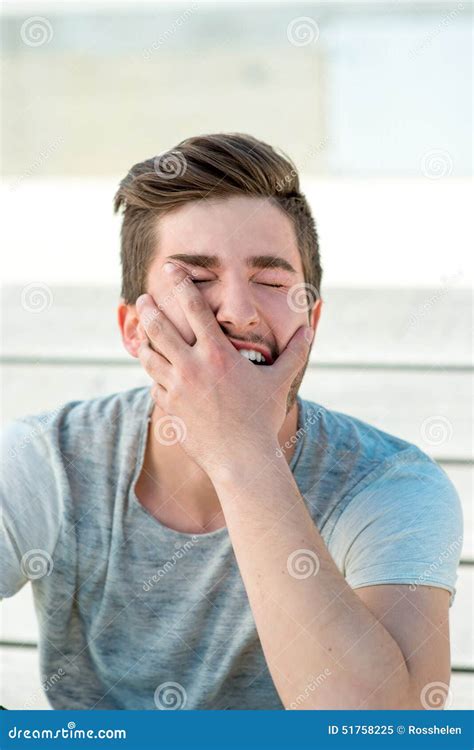 Portrait Of A Young Man Laghing Stock Image Image Of Hand Expression