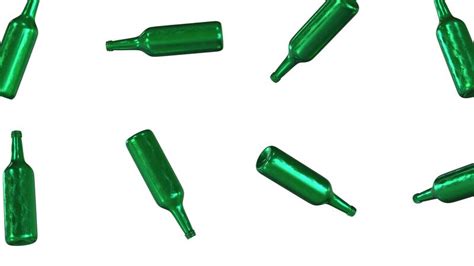 Green Glass Bottles Falling On A White Background Glass Bottle