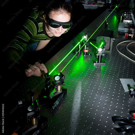 Female Scientist Doing Research In A Quantum Optics Lab Stock Foto Adobe Stock