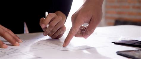 Closeup Hands Young Caucasian Architect Woman Looking Laptop And Working Drawing Blueprint For