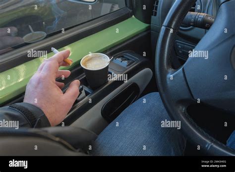 Smoking While Driving A Car While Driving Cigarette In Hand Paper