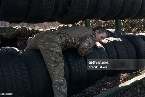 Young Recruits Undergo Military Training In The Form Of An Obstacle