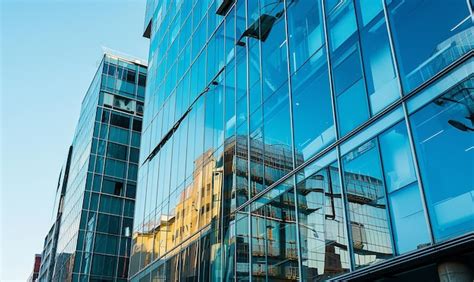 Premium Photo Glass Exterior Of An Office Building Reflecting The