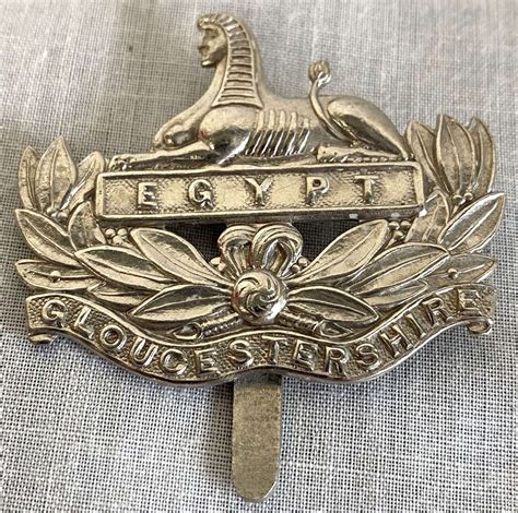 British Military Issue Gloucestershire Regiment Cap Badge In Corps
