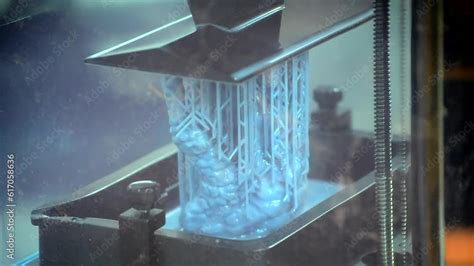 Working Of Photopolymer Sla 3d Printer Platform With Building Object