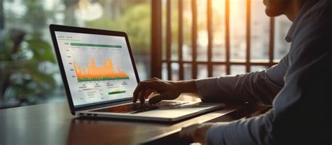 Premium Photo Businessman Using Laptop To Work Analyze Sales Data
