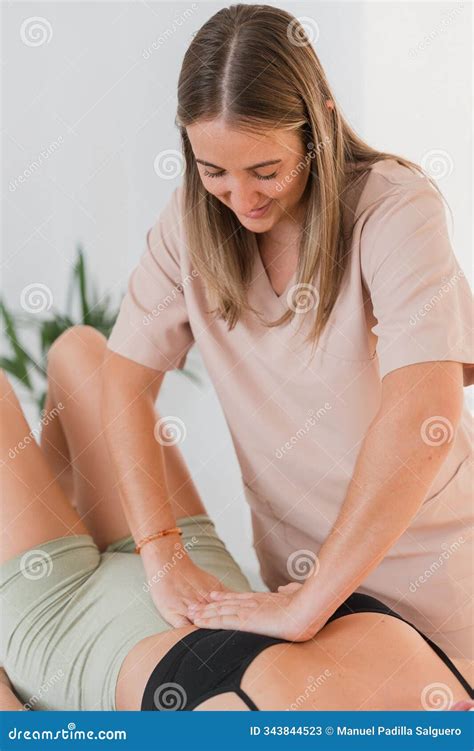 Physiotherapist Performing Spinal Manipulation On Patientand X27 S Lower