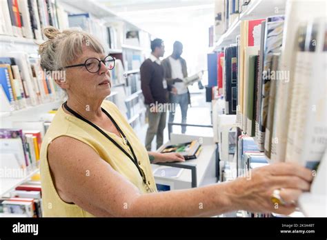 University Female Bookshelf Hi Res Stock Photography And Images Alamy