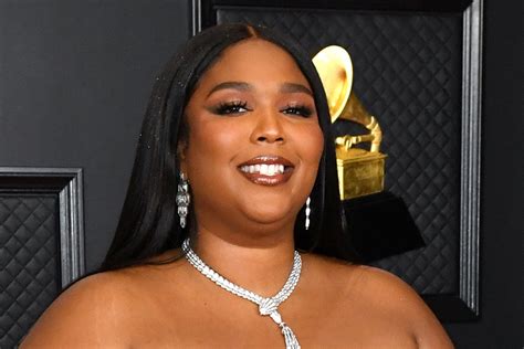 Lizzo Goes Mermaid Chic In A Ruched Green Dress And Glittering Sandals At