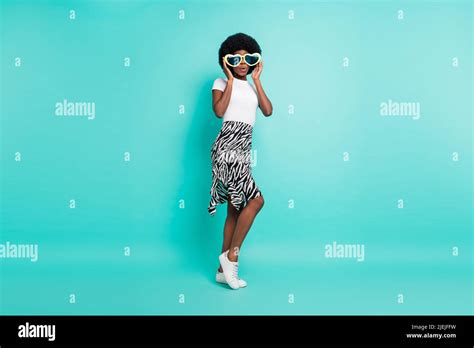Photo Of Charming Excited Dark Skin Lady Wear Casual Clothes Heart