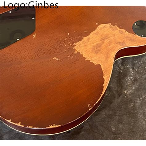 Electric Gutiar One Piece Mahognay Body And Neck Fret Nibs Small Pin