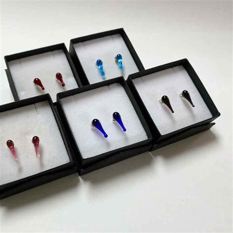 Drip Studs Wearing Glass