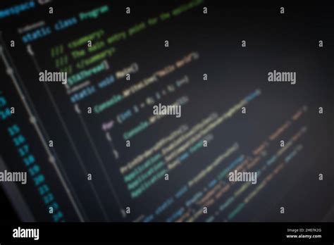 C Hello World Code On Screen Blurry Background Image Stock Photo Alamy