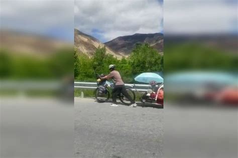 单亲爸爸带4岁儿子从西安骑行去拉萨：想带他走遍全国