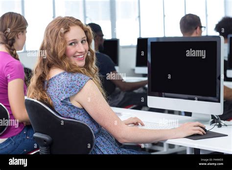 Student Smiling At Camera In Computer Class Stock Photo Alamy