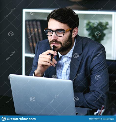 Wrapping His Head Around All His Innovative Ideas A Young Businessman
