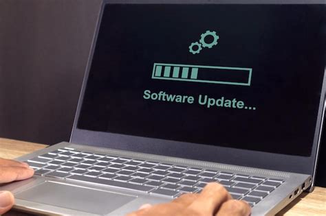 Premium Photo A Laptop On The Table With Updating Progress Bar On