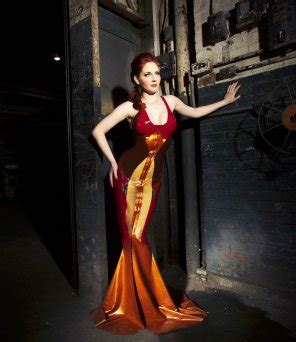 Hot Redhead In A Fancy Latex Dress Porn Pic