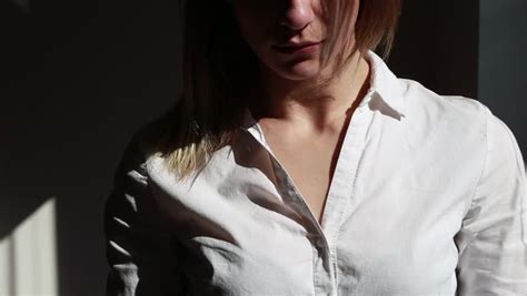 Young Woman Unbuttoning White Blouse Next Stock Footage Video 100