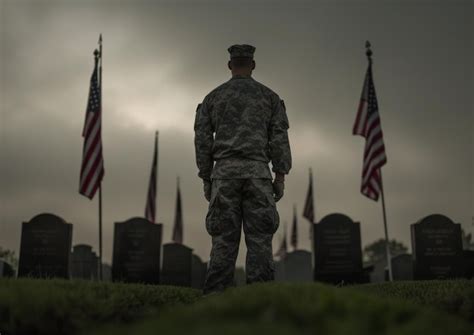Premium Photo Usa Soldier Standing Alone Visiting Military Cemetery
