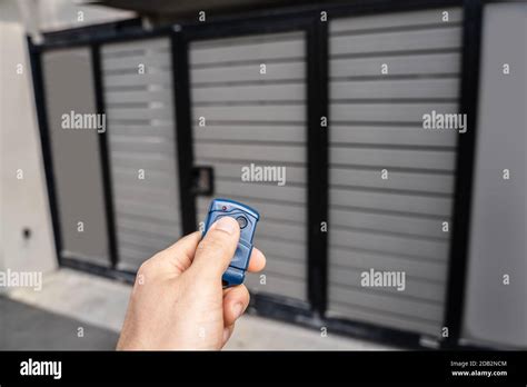Using Remote Control To Open Electric Gate Stock Photo Alamy