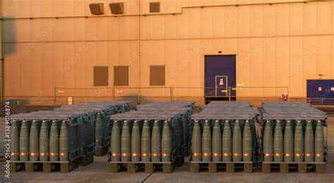 Pallets Of 155 Mm Artillery Ammunition In The Yard Of An Armaments