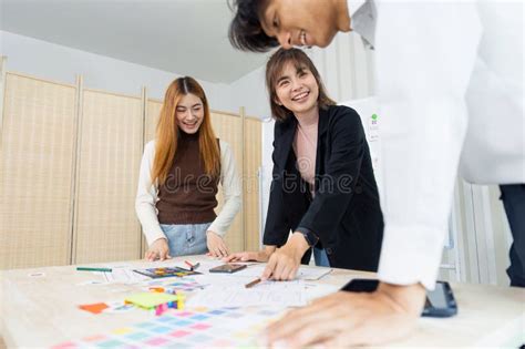Team Of UI UX Web Designer Are Working Together To Develop Mobile
