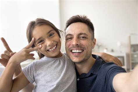 Close Up Portraits Of Smiling Father And Babe Taking Selfie Stock Photo Image Of Care