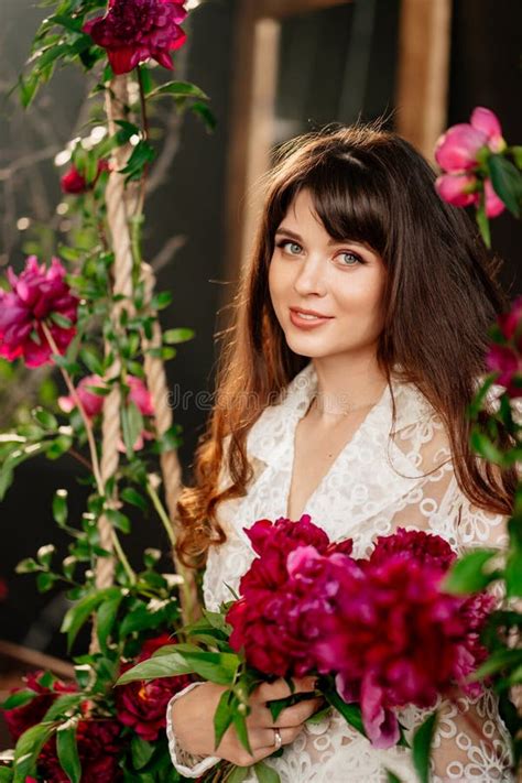Fabulous A Beautiful And Gentle Woman In Peony Flowers Feminine
