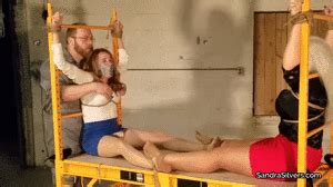 Satin Secretaries Secured To Scaffold Struggle And Squeal Through Intensive Bondage Orgasms