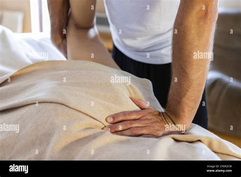 Oil Leg Massage Therapy Masseur Massaging Young Female Legs In A Cosy