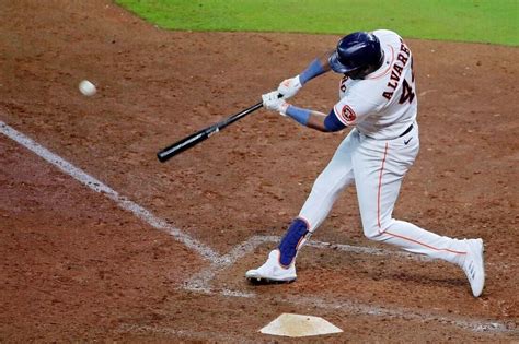 Download Yordan Alvarez Swinging Baseball Action Wallpaper
