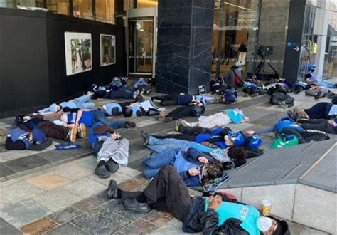 Protesters Stage Die In Outside Australian Media Offices Over Biased