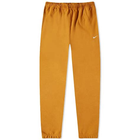 Nike Mens Solo Swoosh Fleece Pant In Desert Ochrewhite Nike