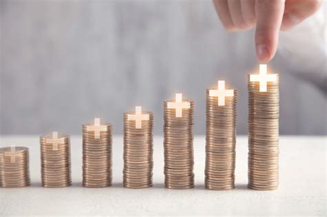 Premium Photo Male Hand Touching In Plus Symbol Stack Of Coins
