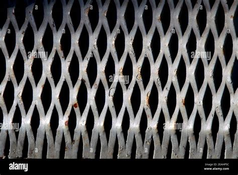 Rusted Metal Mesh Texture On A Black Background Stock Photo Alamy