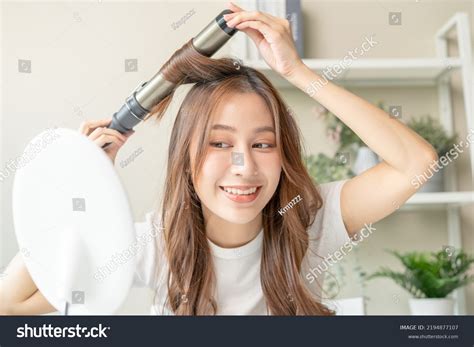 177 Woman Using Iron Hair Curling Curly Long Hair Home Images Stock