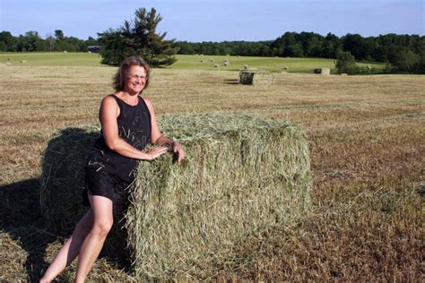 Woman On A Hay Bale Stock Image Image Of Field Grass 7569635