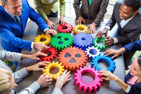 Premium Photo Business Team Connect Pieces Of Gears Teamwork