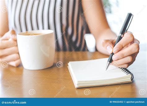 Business Woman Hand Is Writing On Notebookwith A Pen Stock Photo Image Of Form List