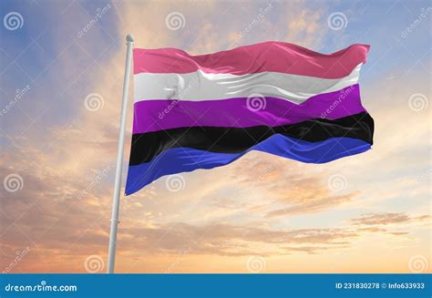 Genderfluidity Pride Flag Waving In The Wind At Cloudy Sky Freedom And