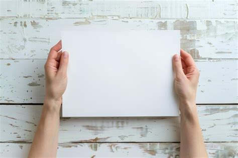 Premium Photo A4 Blank Horizontal Mockup In Hands