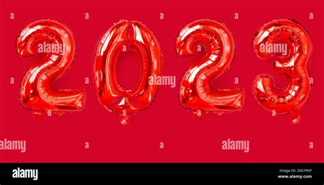 Golden Foil Balloons With The Number 2023 Happy New Year And Christmas