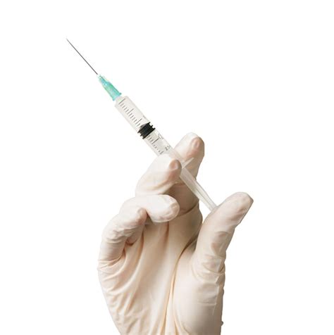 Premium Photo Hand In A Glove Holding Syringe