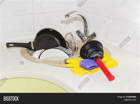 Clog Kitchen Sink Image And Photo Free Trial Bigstock